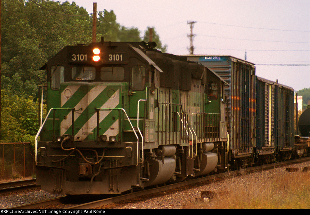 BN 3101, EMD GP50, and sister unit are westbound